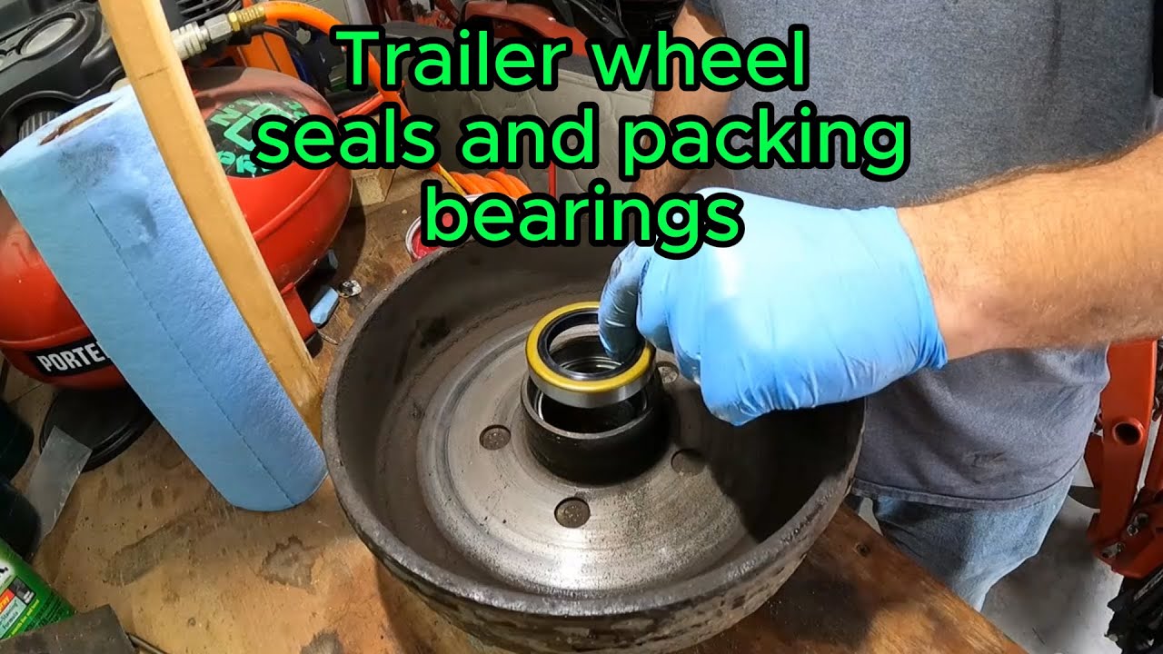Packing trailer bearings and replacing seals - YouTube