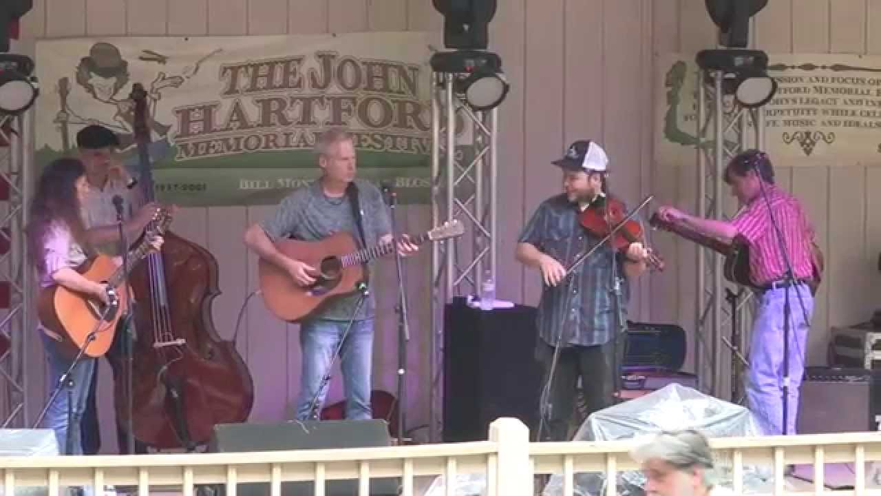 Fiddle contest winner Henry Barnes sitting in with Jamie Hartford and ...