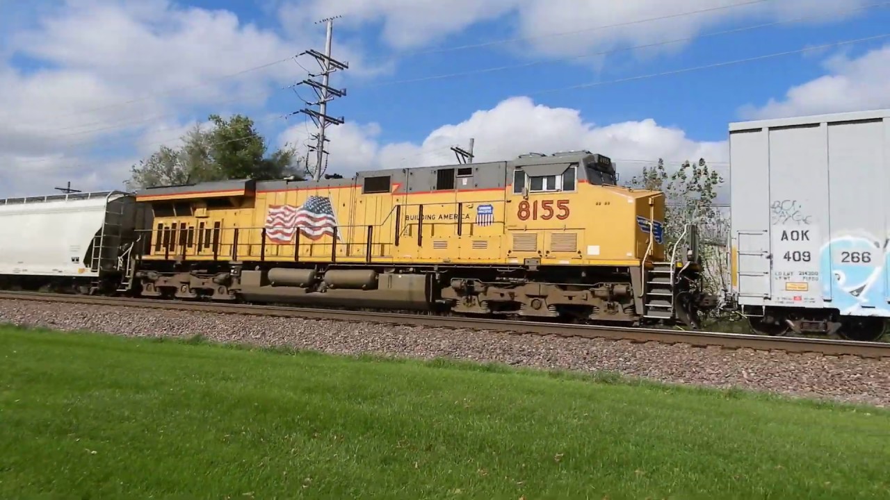 UP 8446 with NS power leads a manifest with UP 8155 as a mid train DPU ...