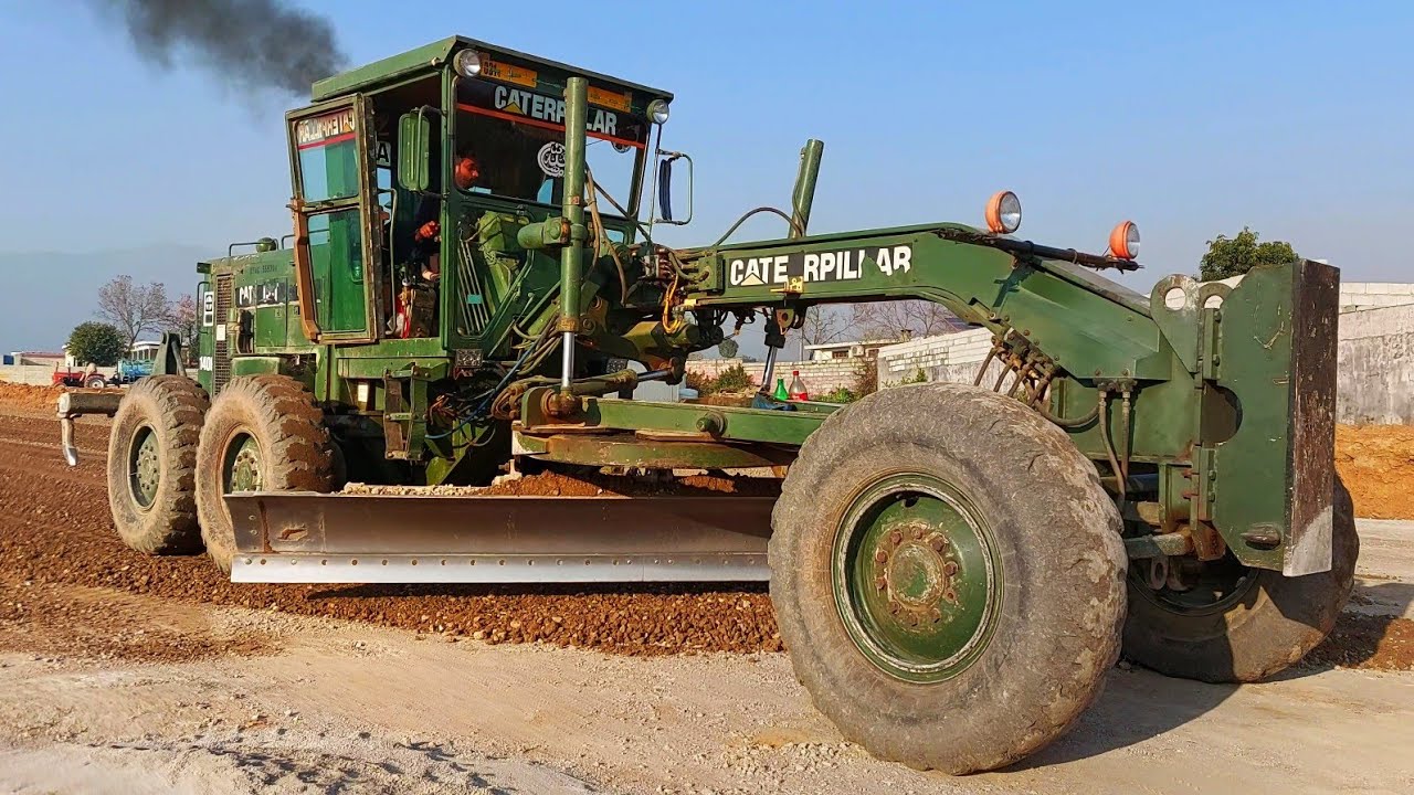 Cat Caterpillar Extremely Skilled Driver On Construction site with dumb ...