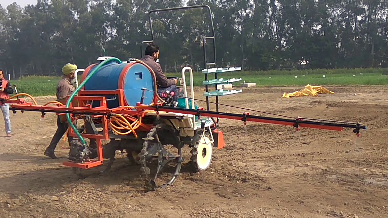 Paddy transplanter fitted with spray system - YouTube