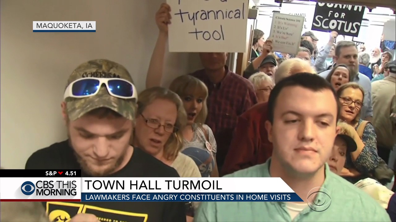 Lawmakers face angry constituents at town hall meetings - YouTube