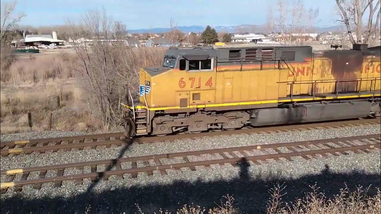 Union Pacific ex CNW AC44CW #6714 leads a pretty long westbound manifest train through Kuna ...