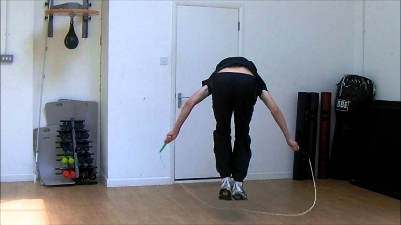 Backwards CL jump rope trick slow motion - YouTube
