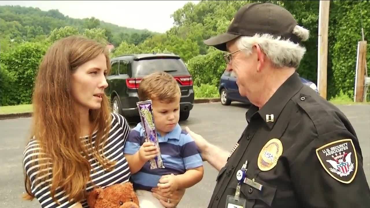 Two security guards honored for saving two-year-old's life - YouTube
