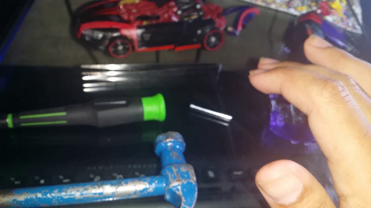 How to remove a pin from a transformers figure - YouTube