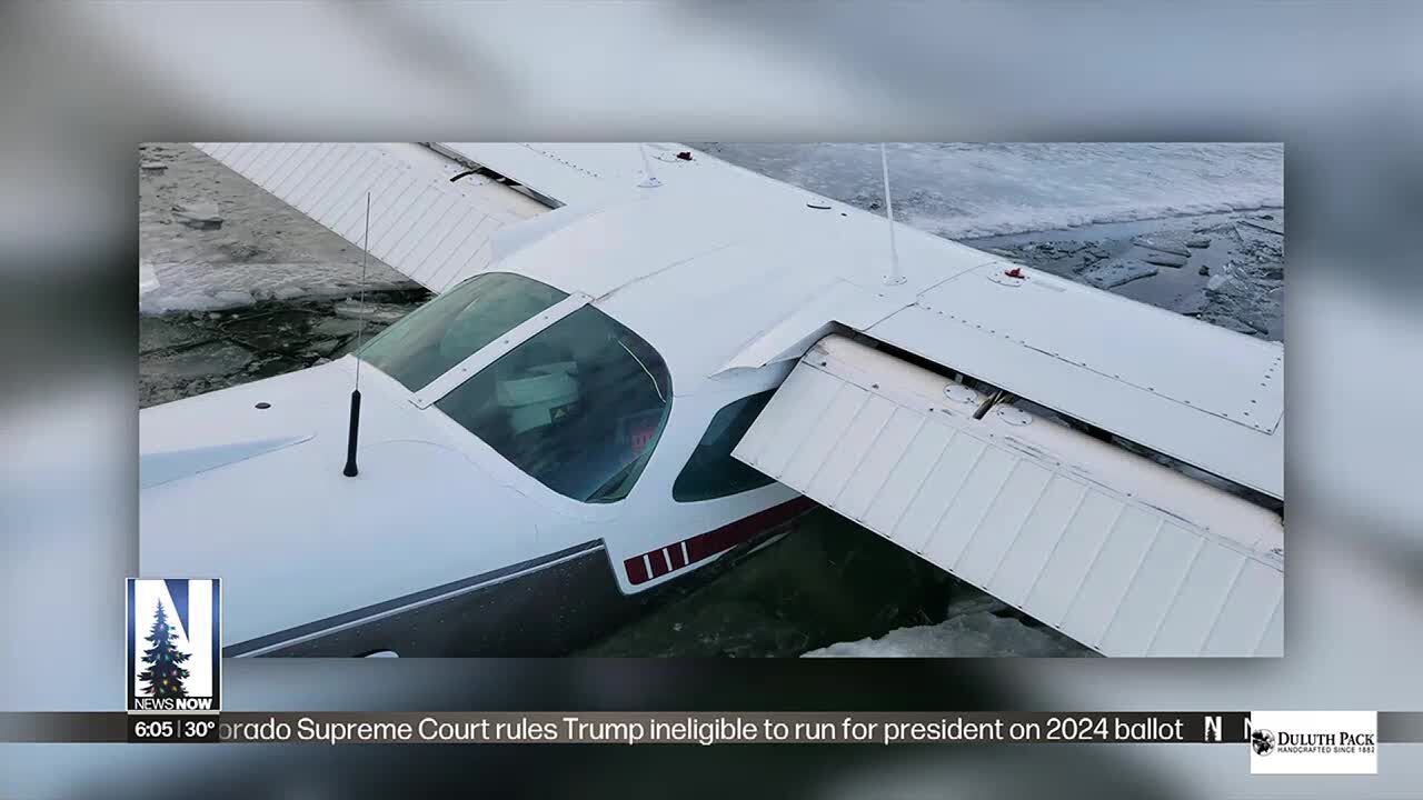 Plane breaks through ice during landing on Upper Red Lake - YouTube