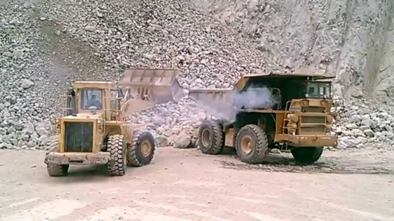 Cat 980C Cargando Yucle 50 Ton. - YouTube