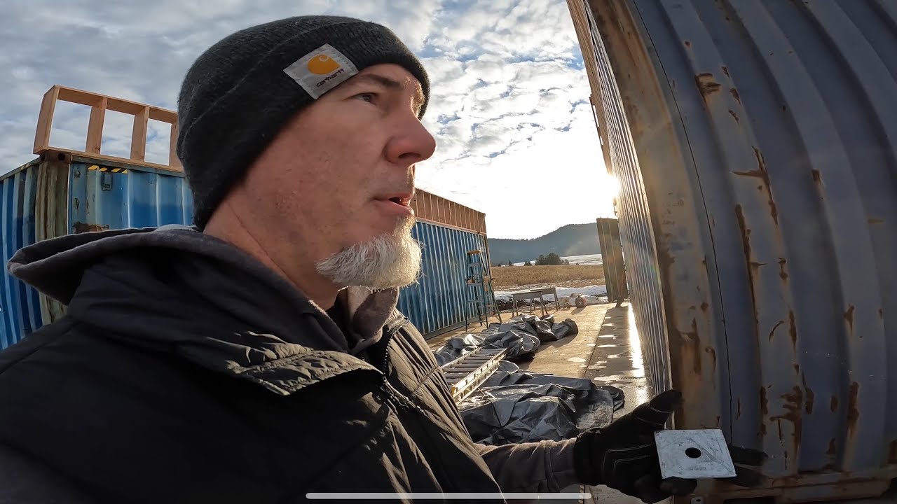 Furring out the front walls of our shipping container barn - YouTube