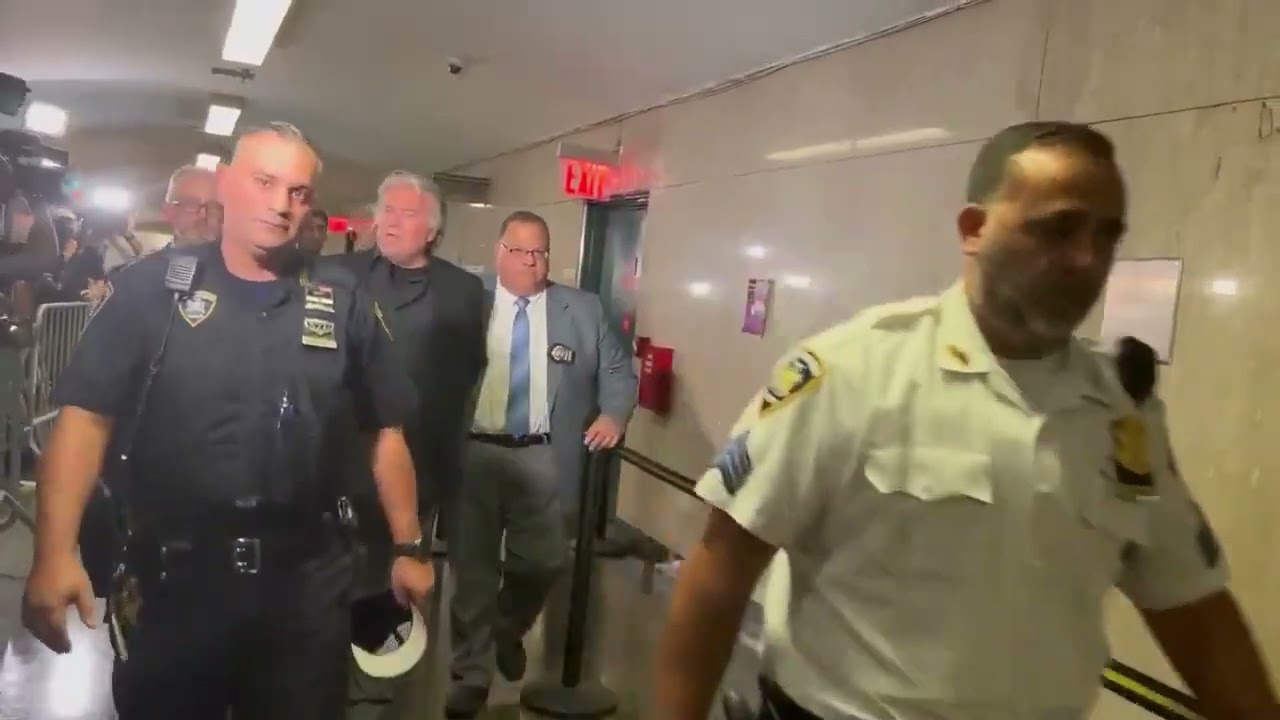 Steve Bannon does a perp walk in handcuffs - YouTube