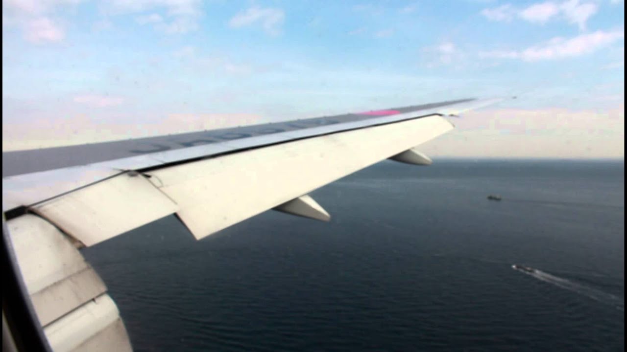 Japan Airlines Flight 504 CTS-HND lands - YouTube