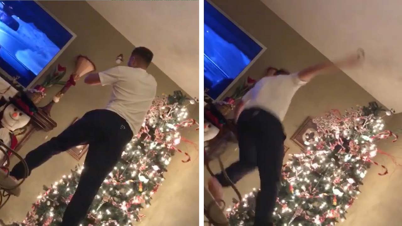 Man Falls Off Chair While Decorating Xmas Tree - YouTube
