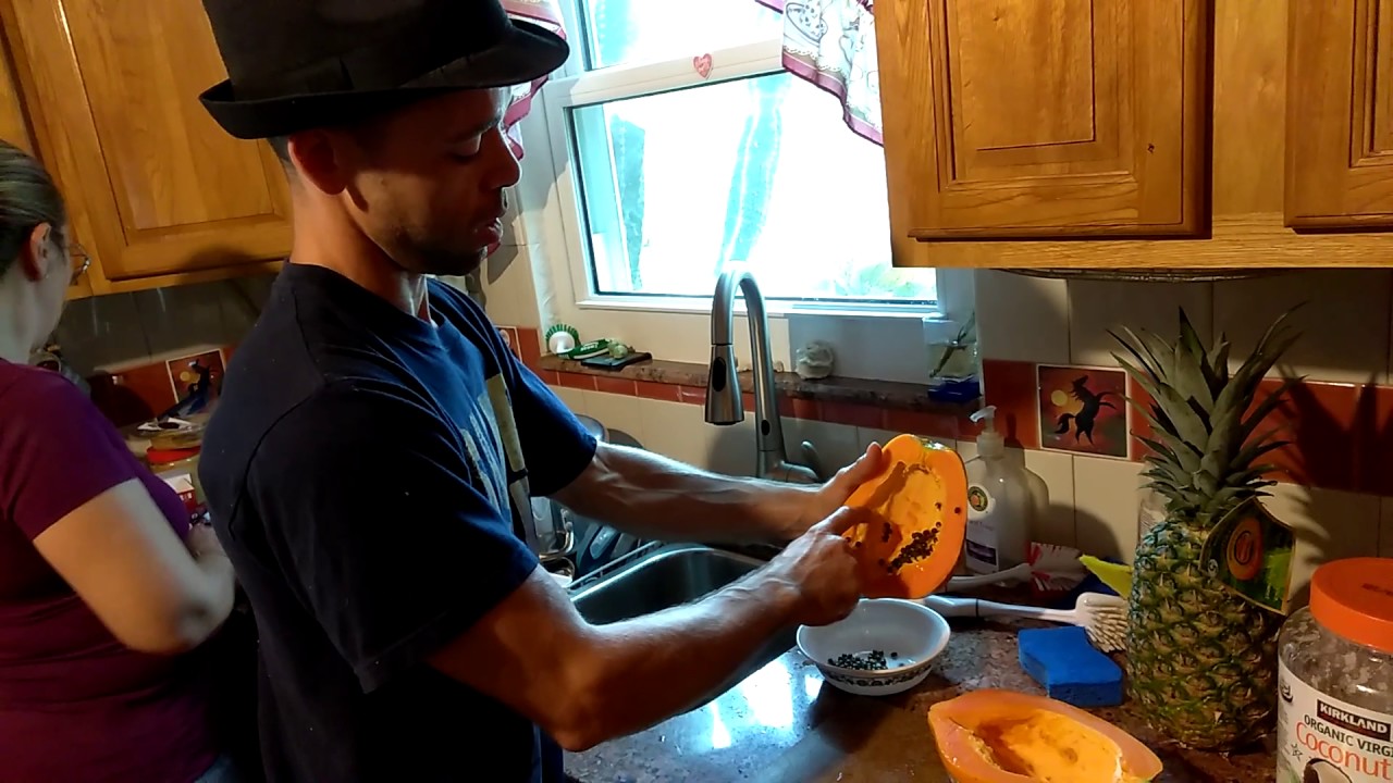 How to cut open and eat a papaya fruit - YouTube