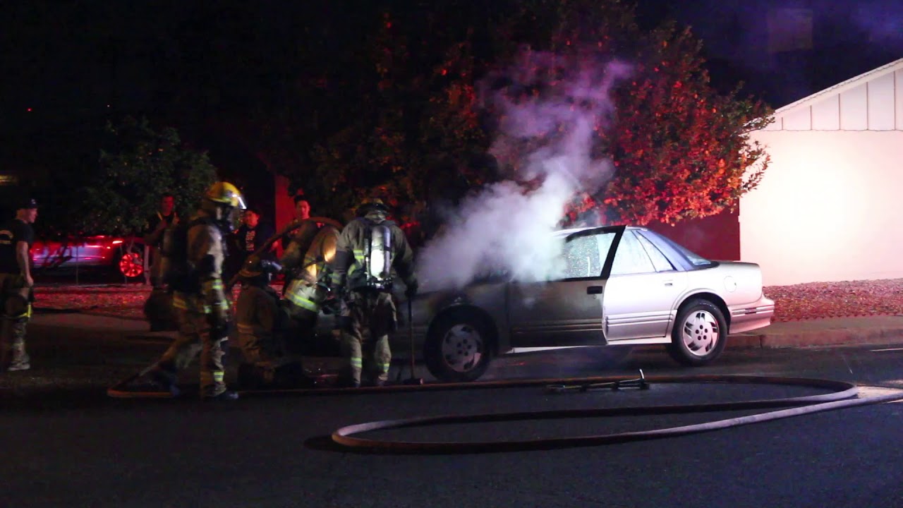 Firefighters Open cars hood after fire - YouTube