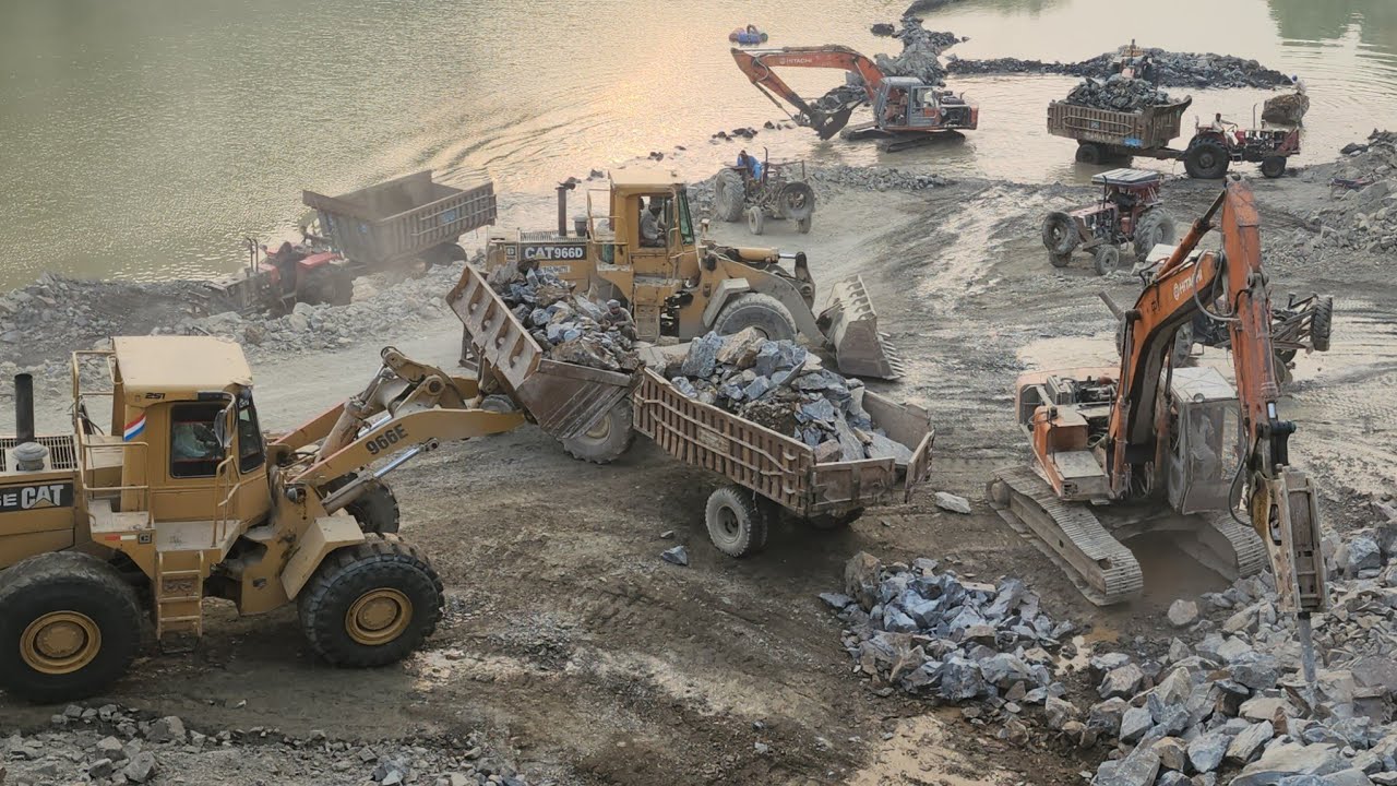 Powerful Caterpillar Wheel Loader Plus Excavator at Work: A Mega Rock ...