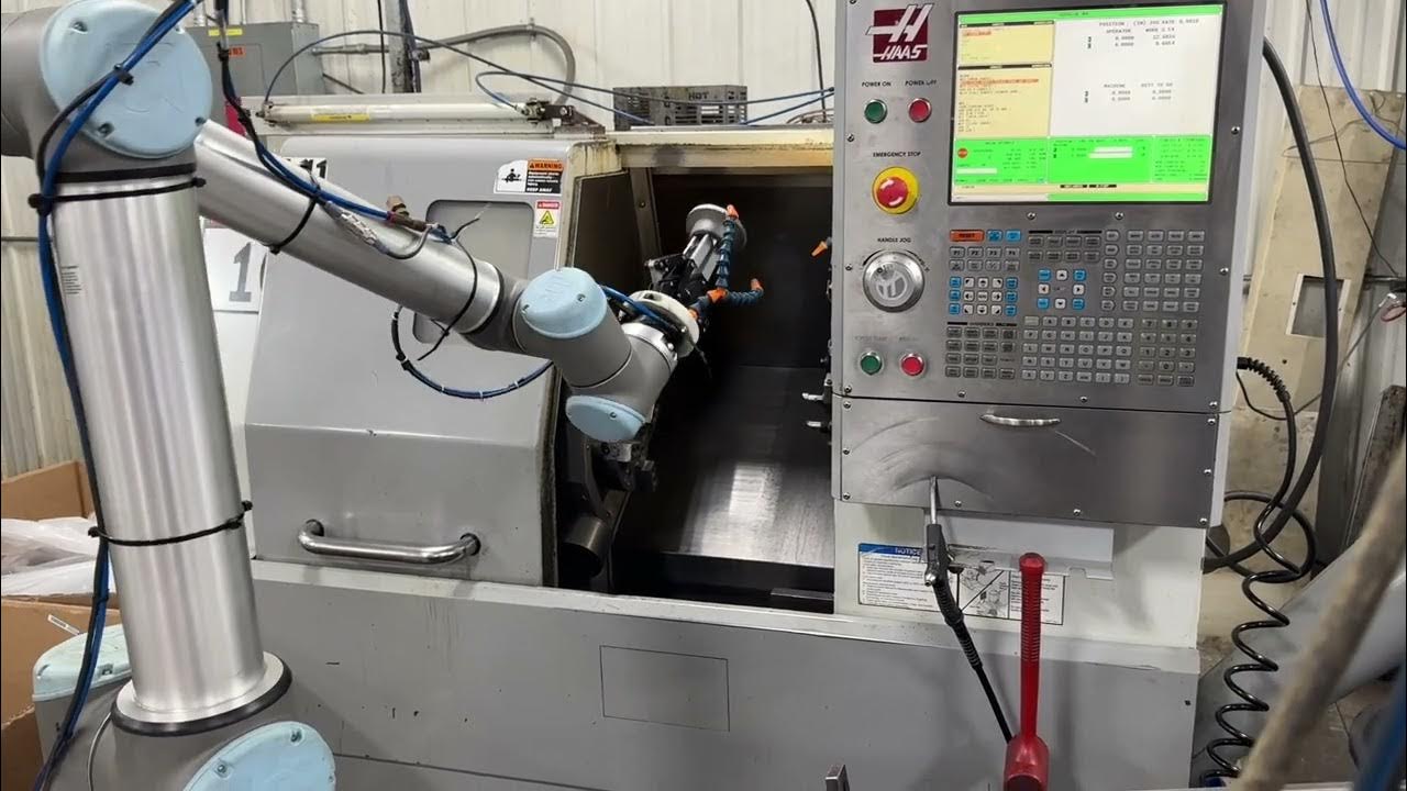Automated Lathe tending with Universal Robot UR10 collaborative robot. www.aptmachining.com ...