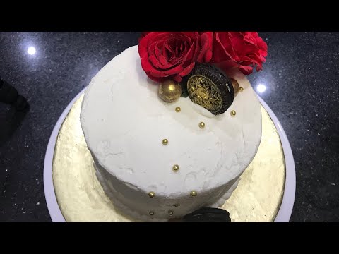 Fresh roses and gold pearl cake decoration by Bake n Bites