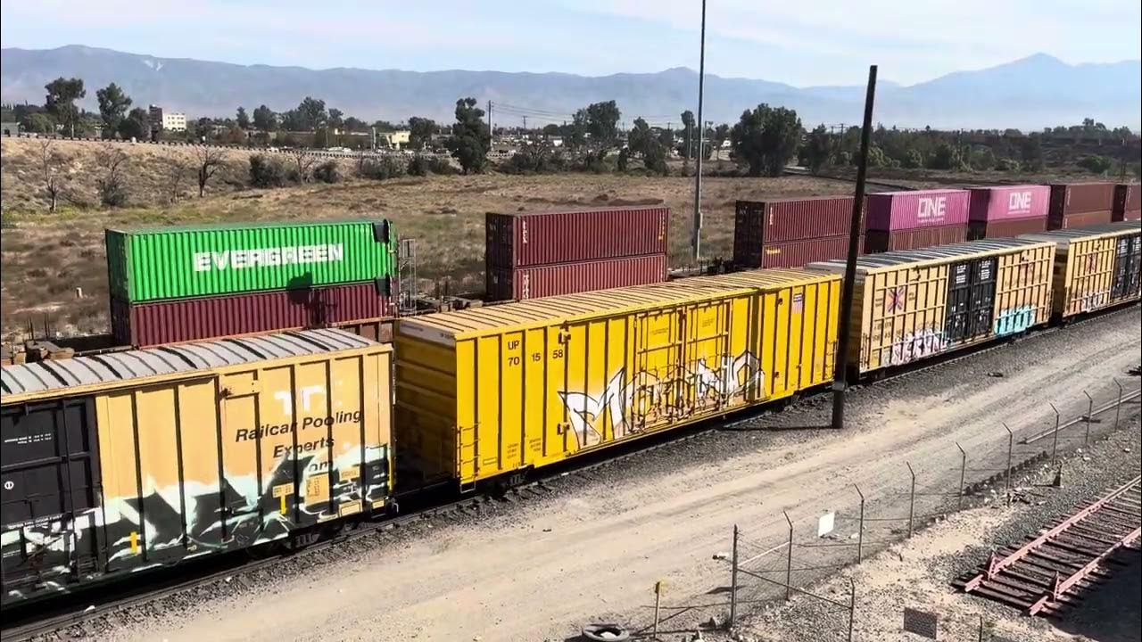 UP 1867 Switchyard Meets UP 6739 Westbound Stack Train at West Colton Yard - YouTube