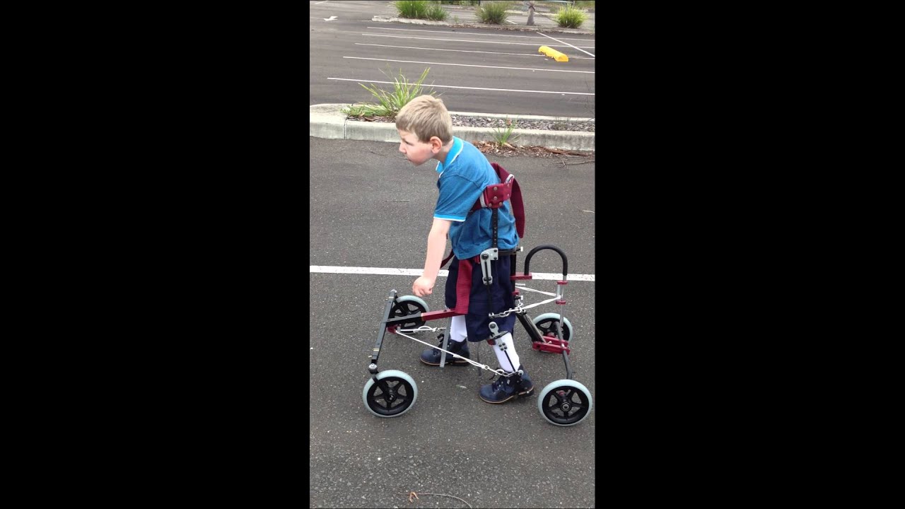 Liam in his Hart Walker in the school holidays - YouTube