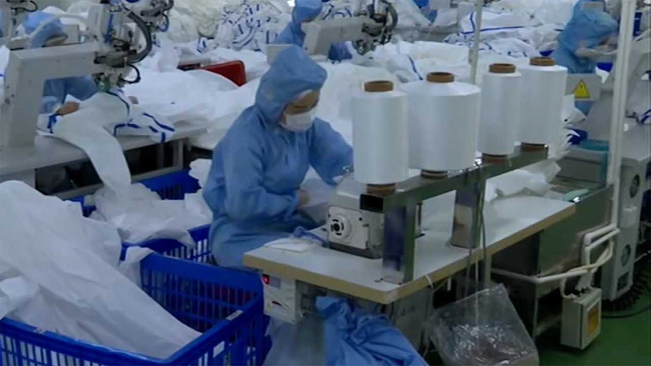 Wuhan factory expands production of medical supplies - YouTube