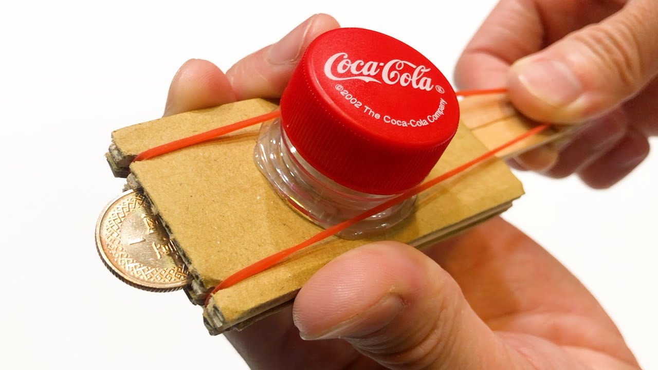 How to Make a Coin Gun at Home - YouTube