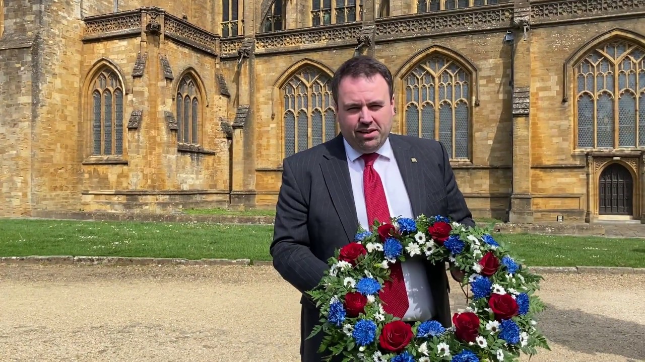 Chris Loder MP lays a wreath at VE Day 75th Anniversary service, on ...