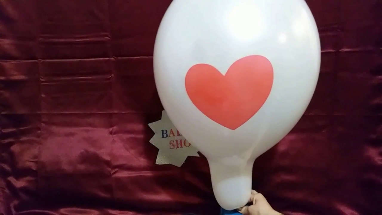 Heart balloon pops in slow motion! - YouTube