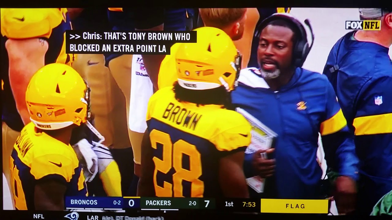 Fadol Brown #28 pently on interference of kicking team Packers/Broncos ...