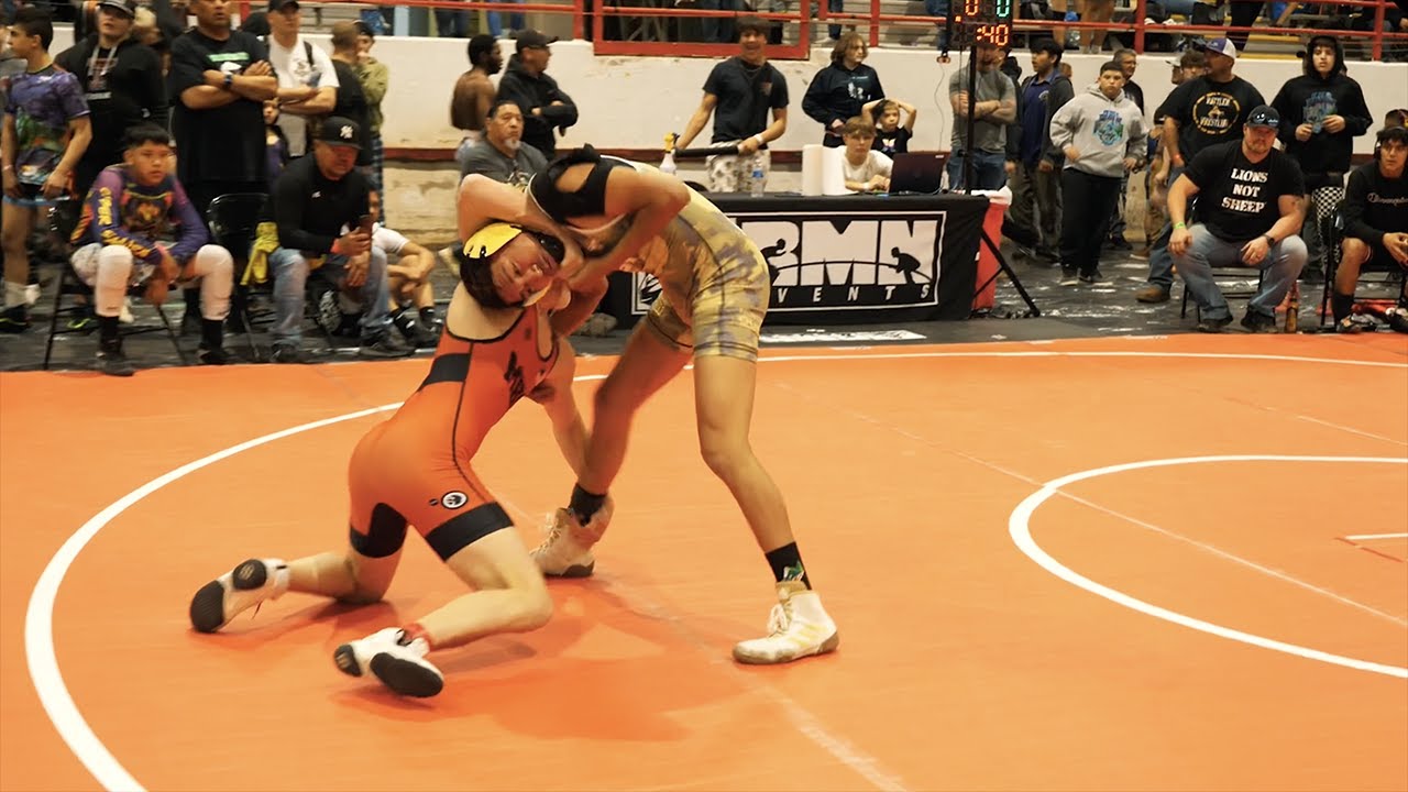 James Schaefer of Montrose Elite [R] and Landin Clark of Roughneck [G ...