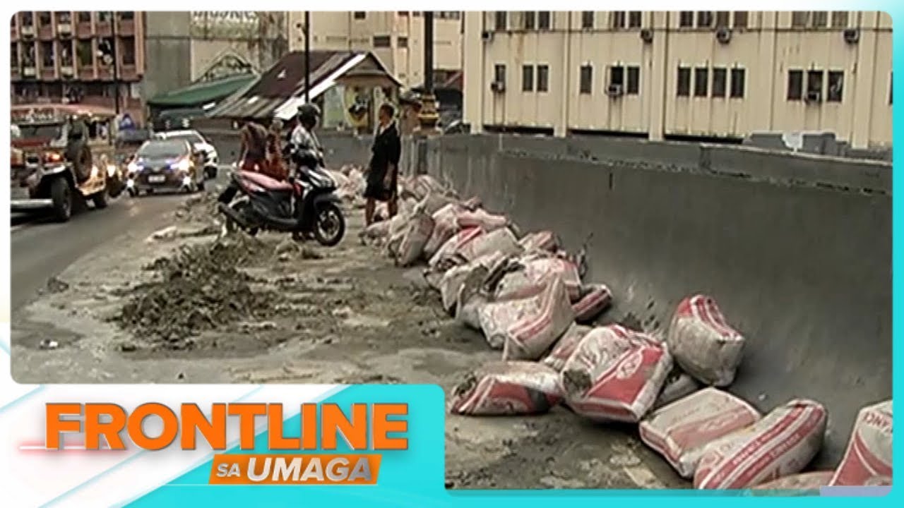 400 sako ng semento, nahulog sa westbound ng Quezon bridge sa Maynila ...