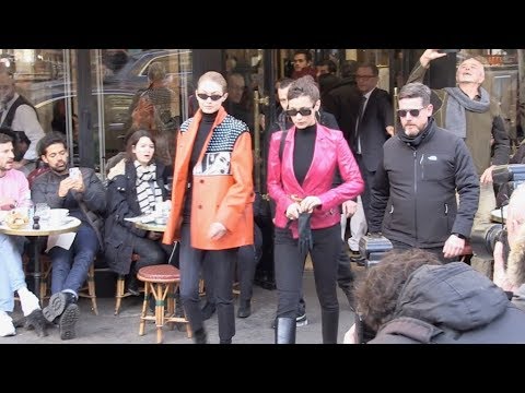 EXCLUSIVE : Bella Hadid and Gigi Hadid come out of Cafe de Flore in Paris