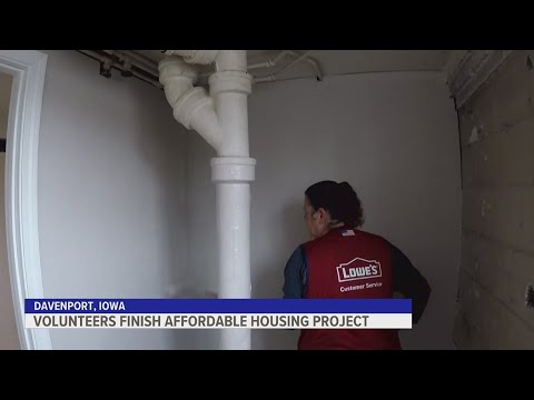 Volunteers putting finishing touches on affordable housing project ...
