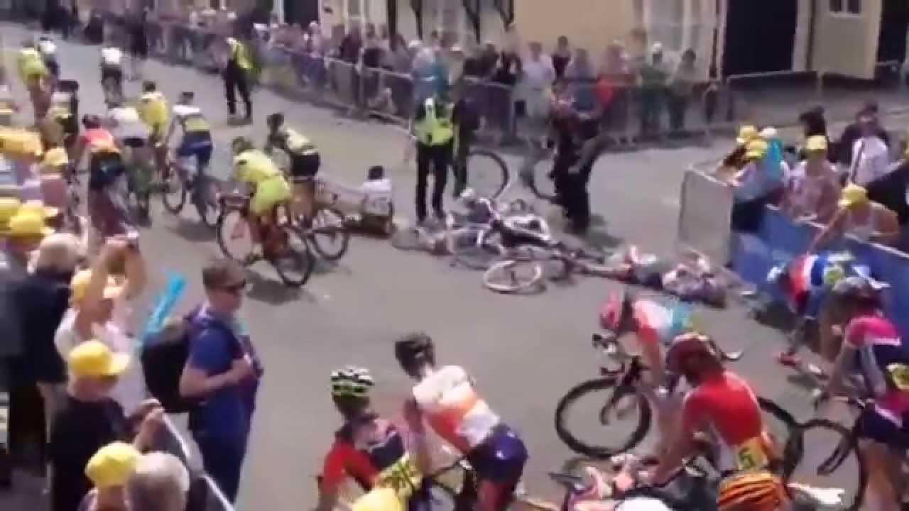Cyclist injured in a massive crash seconds after winning a race - YouTube