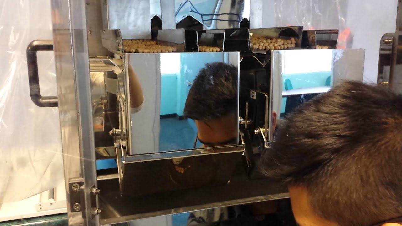 semi-automatic 2-head linear weighing scale - YouTube