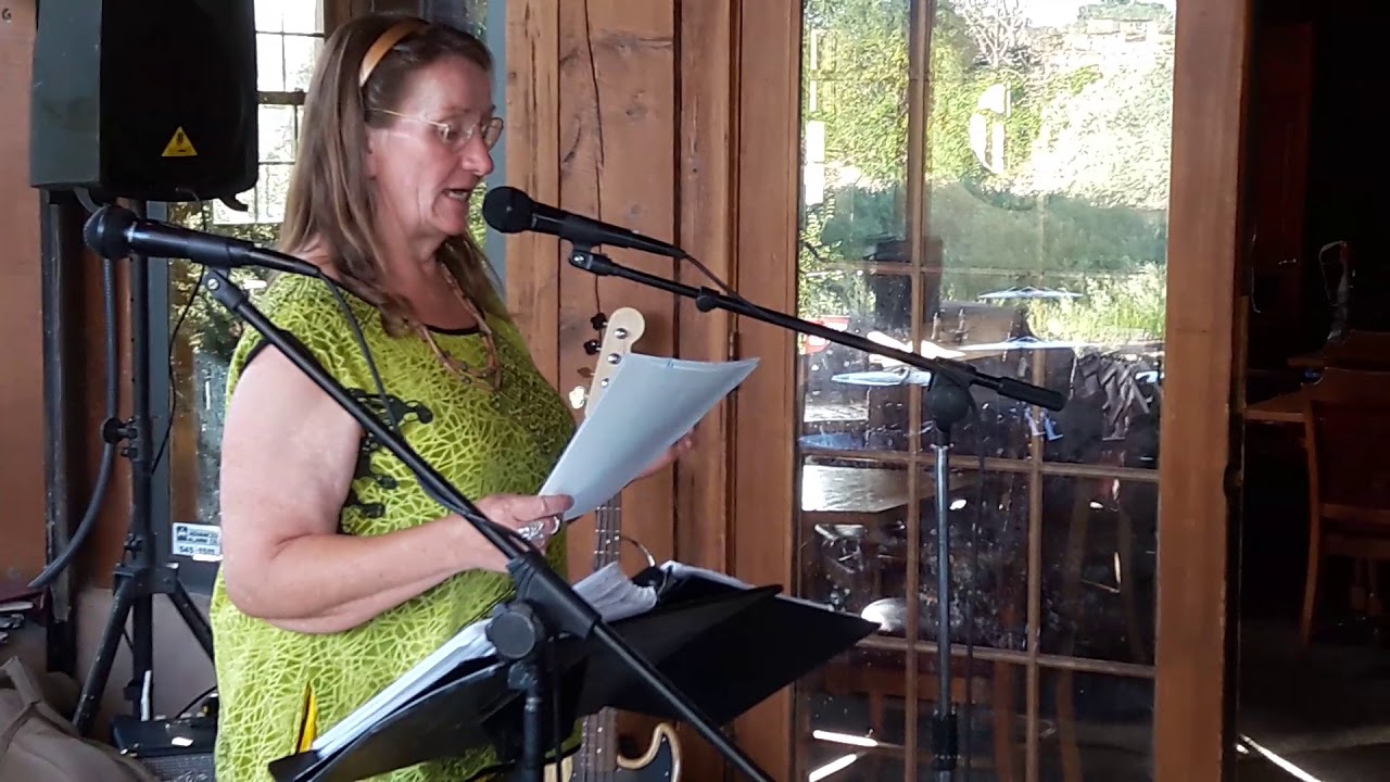 Tami McDowell presenting her poetry on the Rolling River Open Mic @t ...