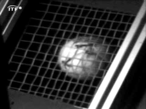 Tennis racket string bed inpacting a tennis ball - YouTube