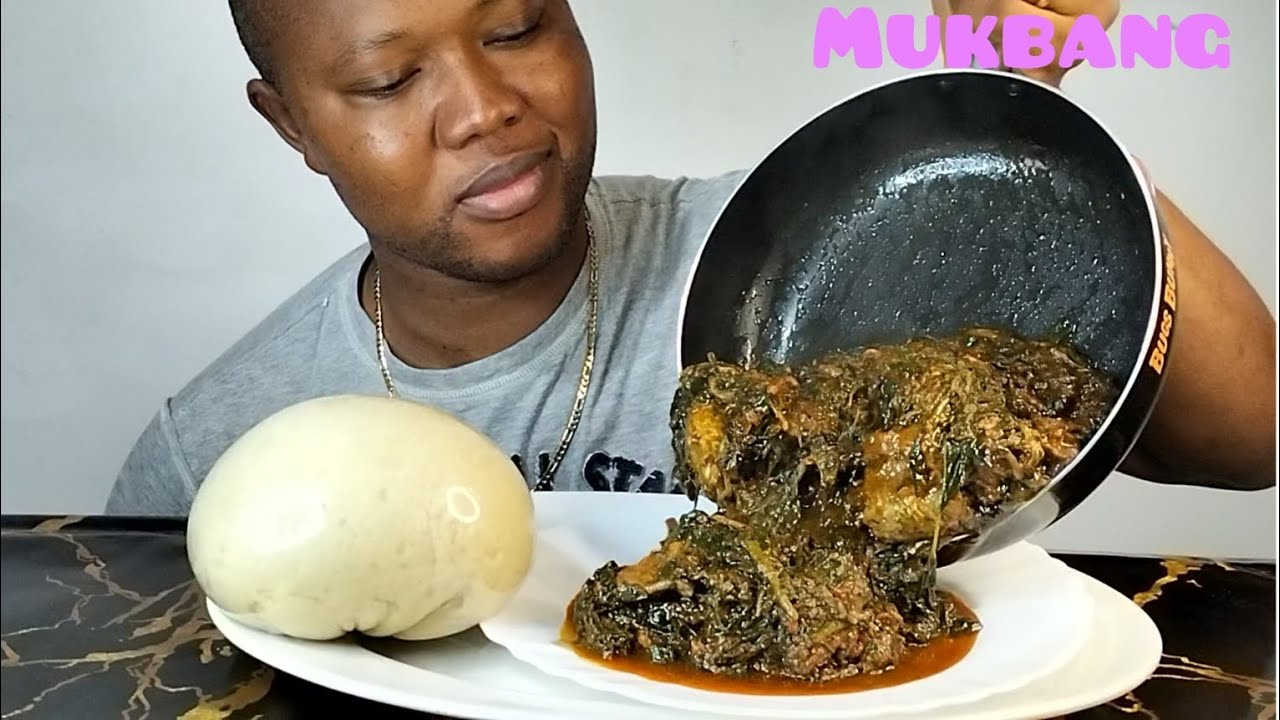 African food mukbang{ pounded fufu with spicy goat meat vegetable soup ...