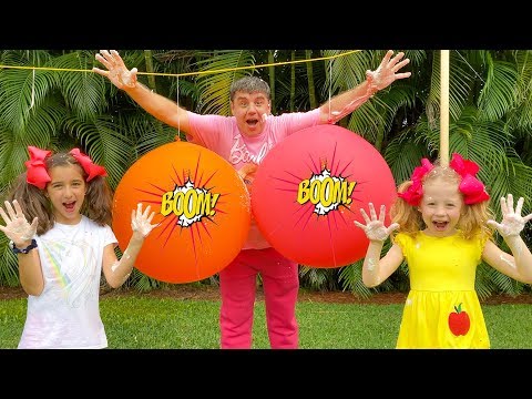 Nastya and dad are popping balls with surprises