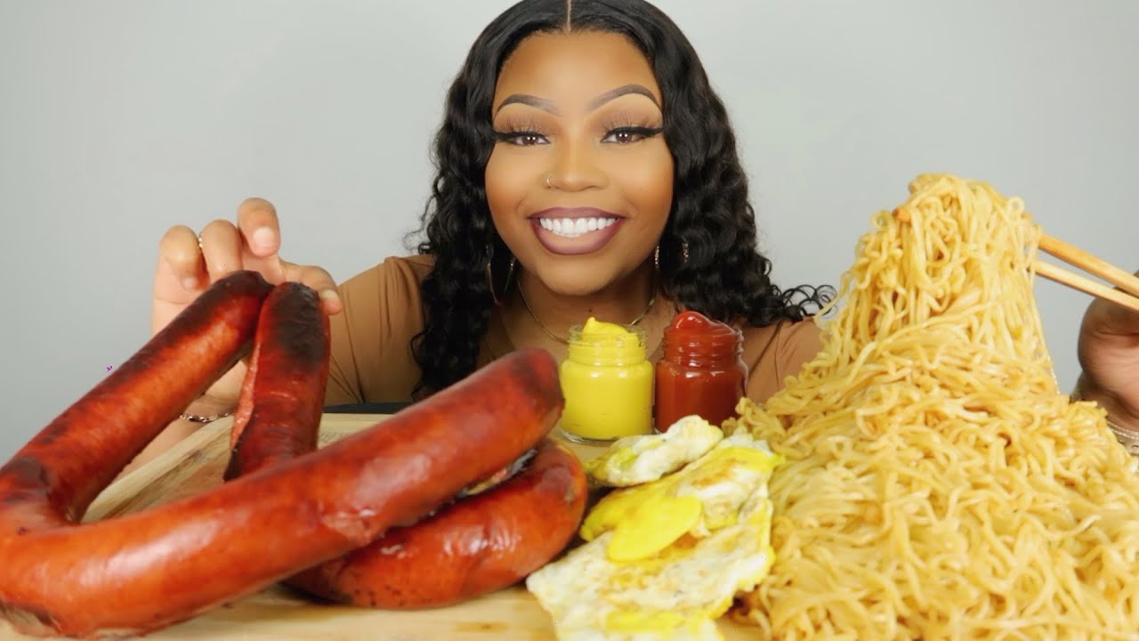 Woman Eating Sausage