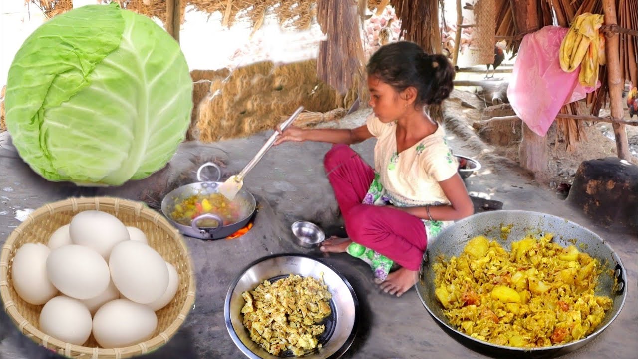 village girl can cook everything||CABBAGE EGG curry cooking by santali ...