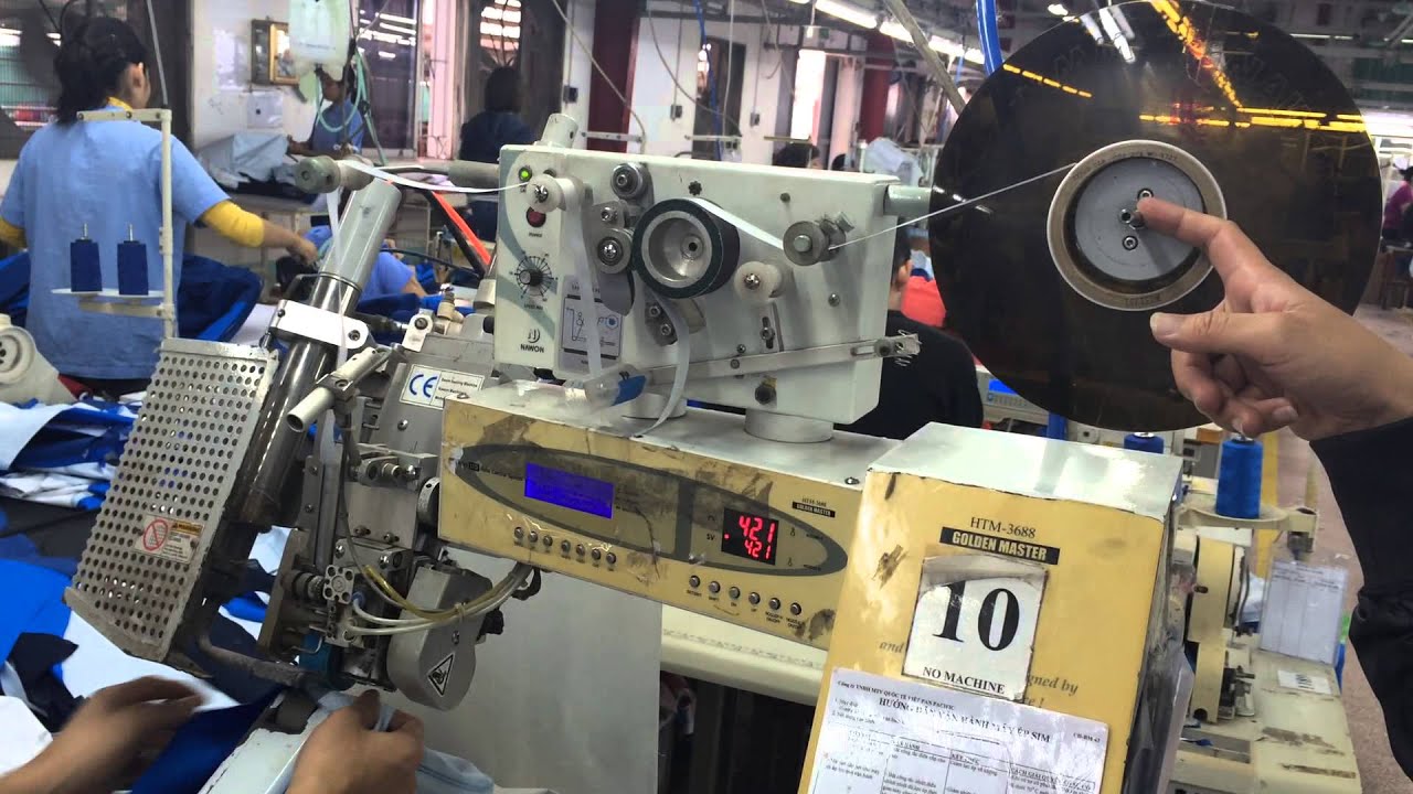 seam tape feeding process on a seam sealing machine - YouTube