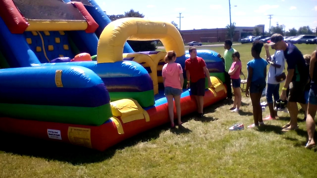 Cici & Jacob race up the bouncy house - YouTube