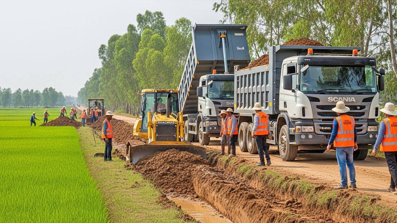 Rural Roadwork in Action | Bulldozer Carves Path Beside Rice Fields ...