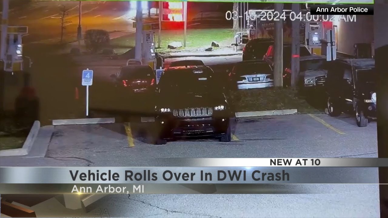 Vehicle rolls over in DWI crash - YouTube