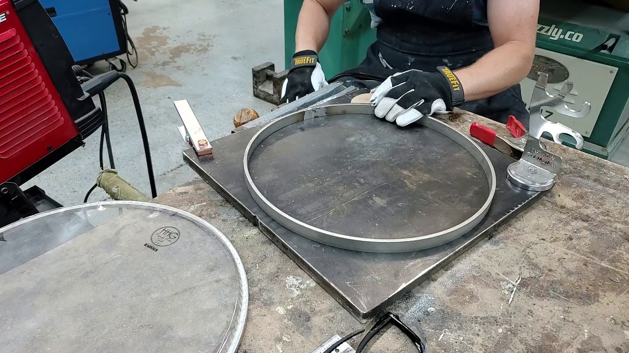 Tig welding drum hoops - YouTube