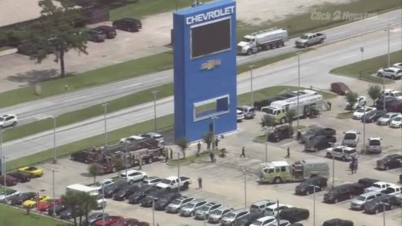 Heat exhaustion victim rescued from sign - YouTube