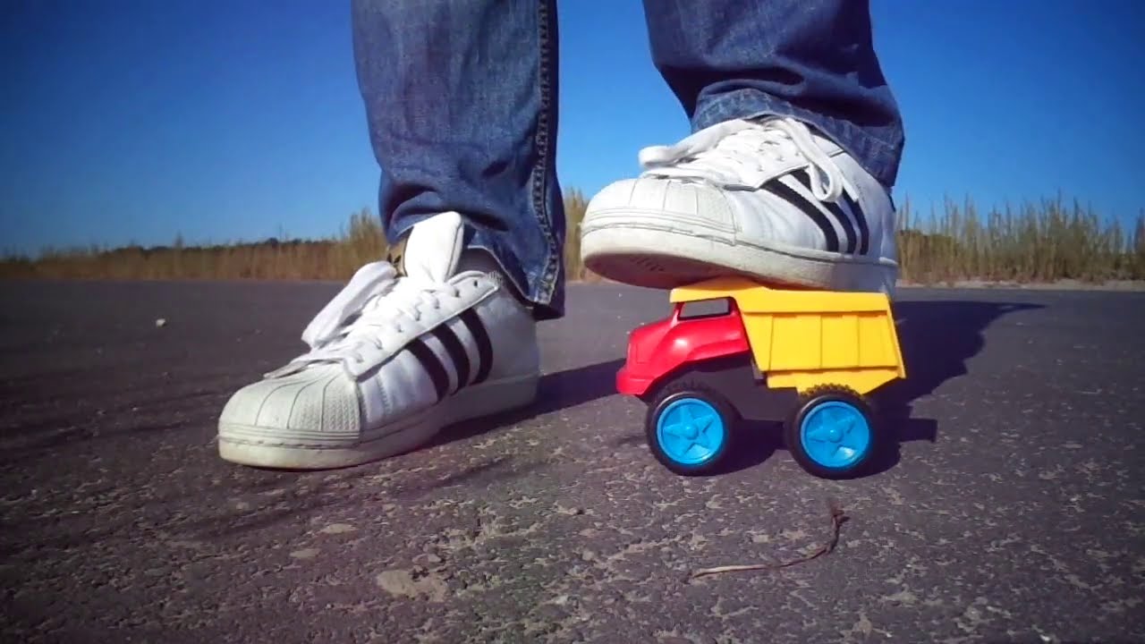 Adidas Superstars stomp, trample and destroy plastic toy car - YouTube
