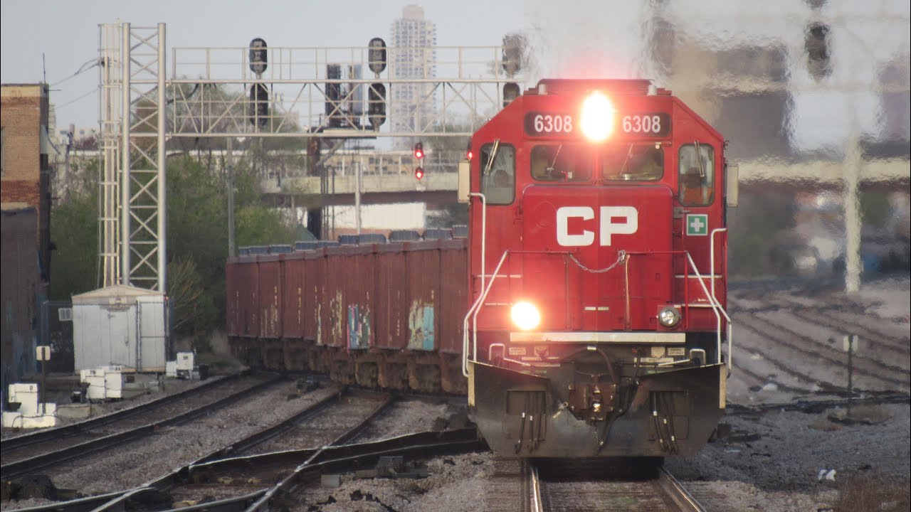 CP 6308 and KCS 3928 lead WB ballast train (full train) through Galewood! - YouTube