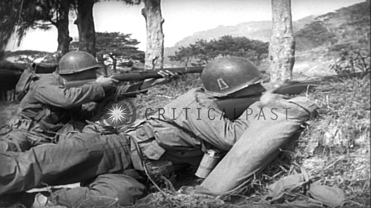 US Army 77th Infantry Division Soldiers Fire Artillery In The Ryukyu us-army-77th-infantry-division-soldiers-fire-artillery-in-the-ryukyu