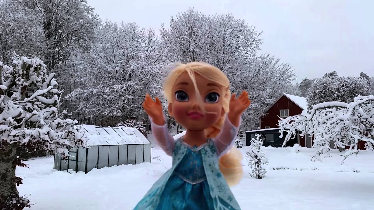 Frozen Elsa doll singing in the snow - YouTube